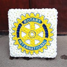 Rotary Club Logo Wreath Made in Flowers For A Funeral - Plantwise